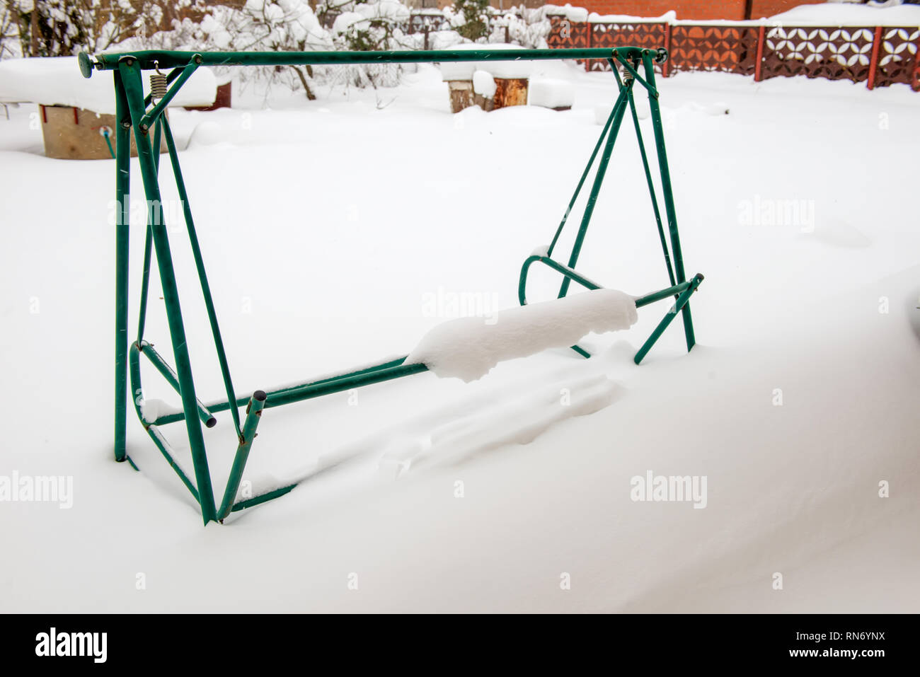 Broken swing in playground hi-res stock photography and images - Alamy