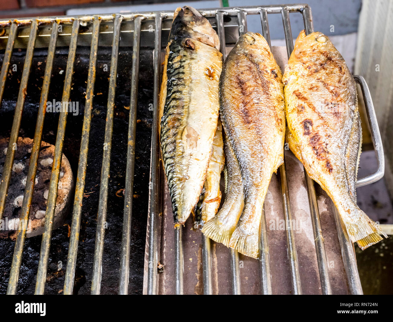 Fried fish on the grill at the Gwangjang Market. Seoul, South Korea ...