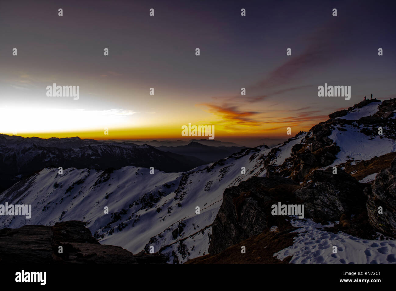 Sunrise at the Kedarkantha summit Stock Photo - Alamy