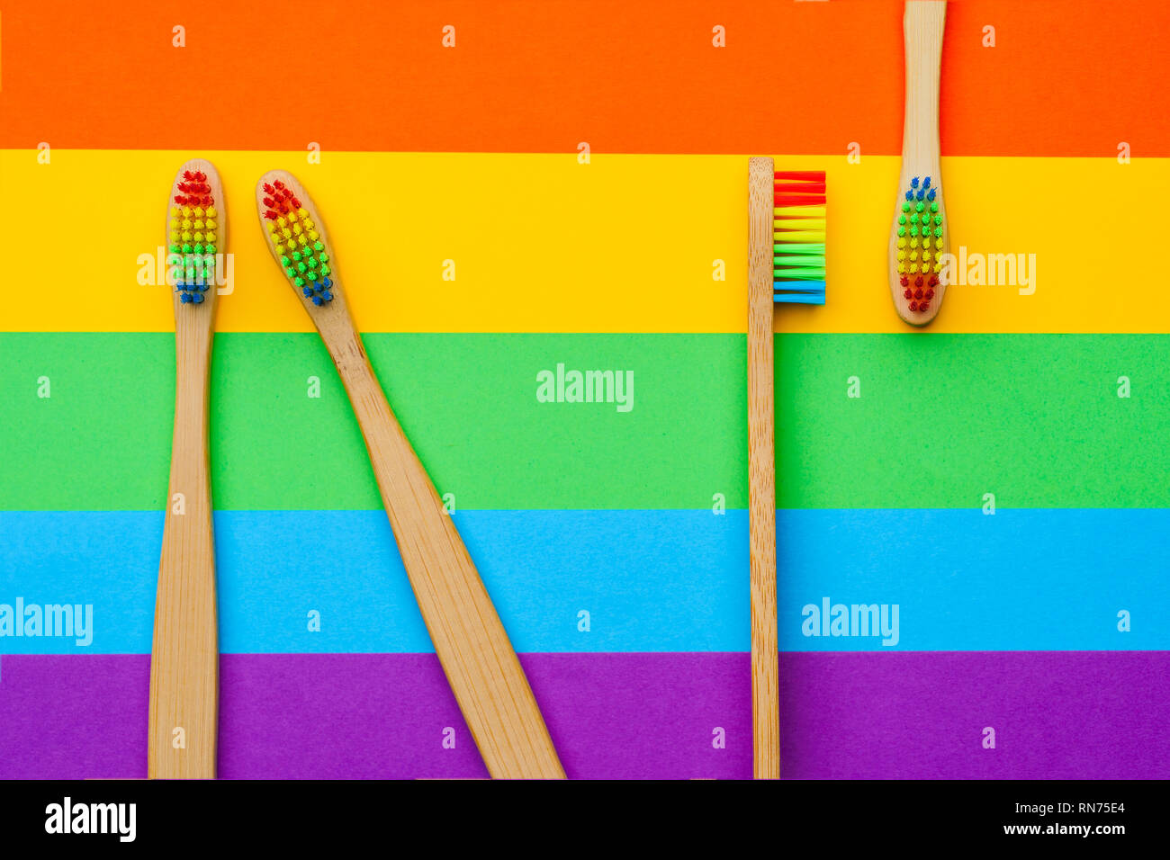 Image on top of four toothbrushes Stock Photo - Alamy