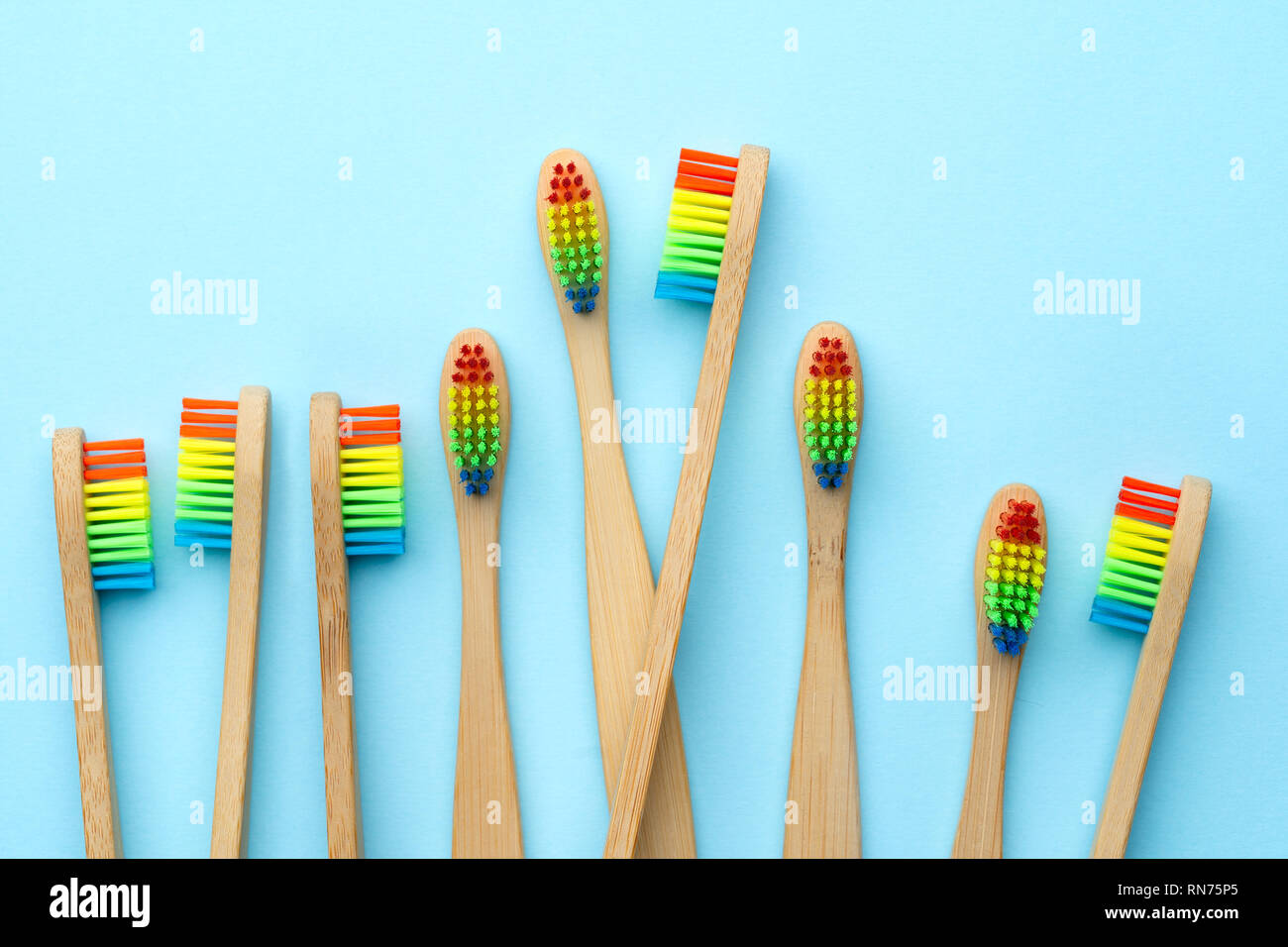 Photo of many toothbrushes with rainbow-colored bristles Stock Photo ...