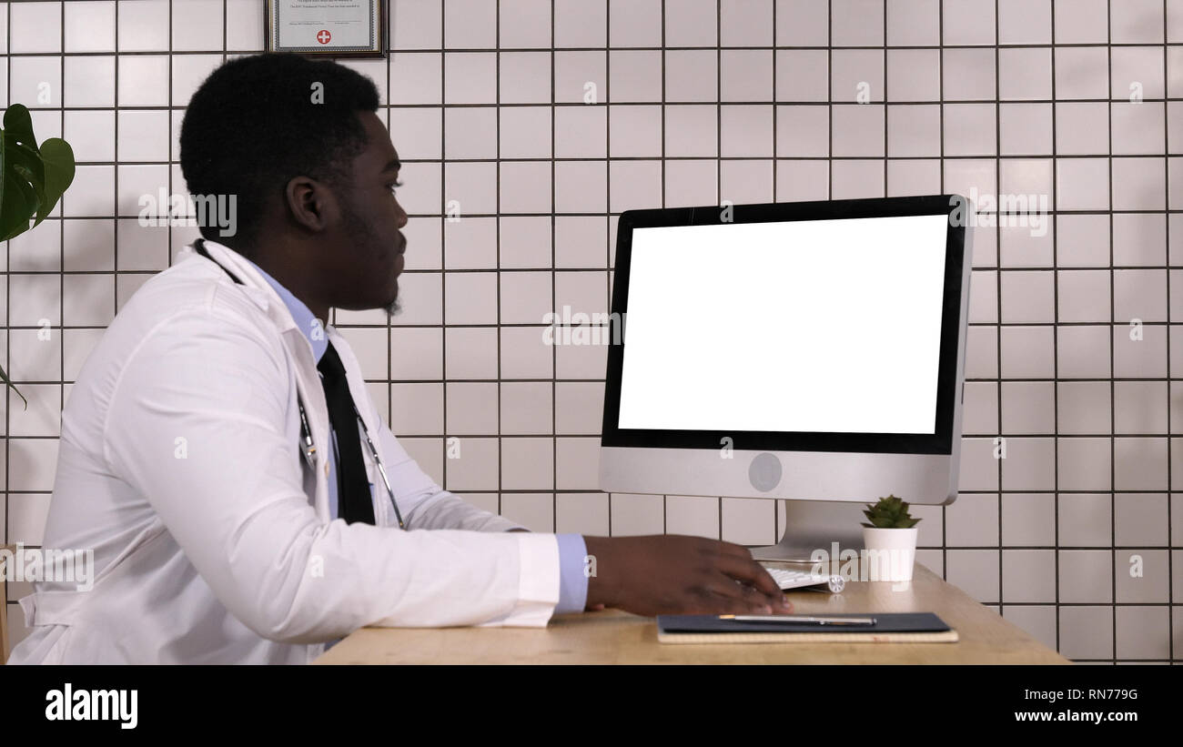 In Medical Laboratory Afro American Doctor Looking At Computer Screen ...