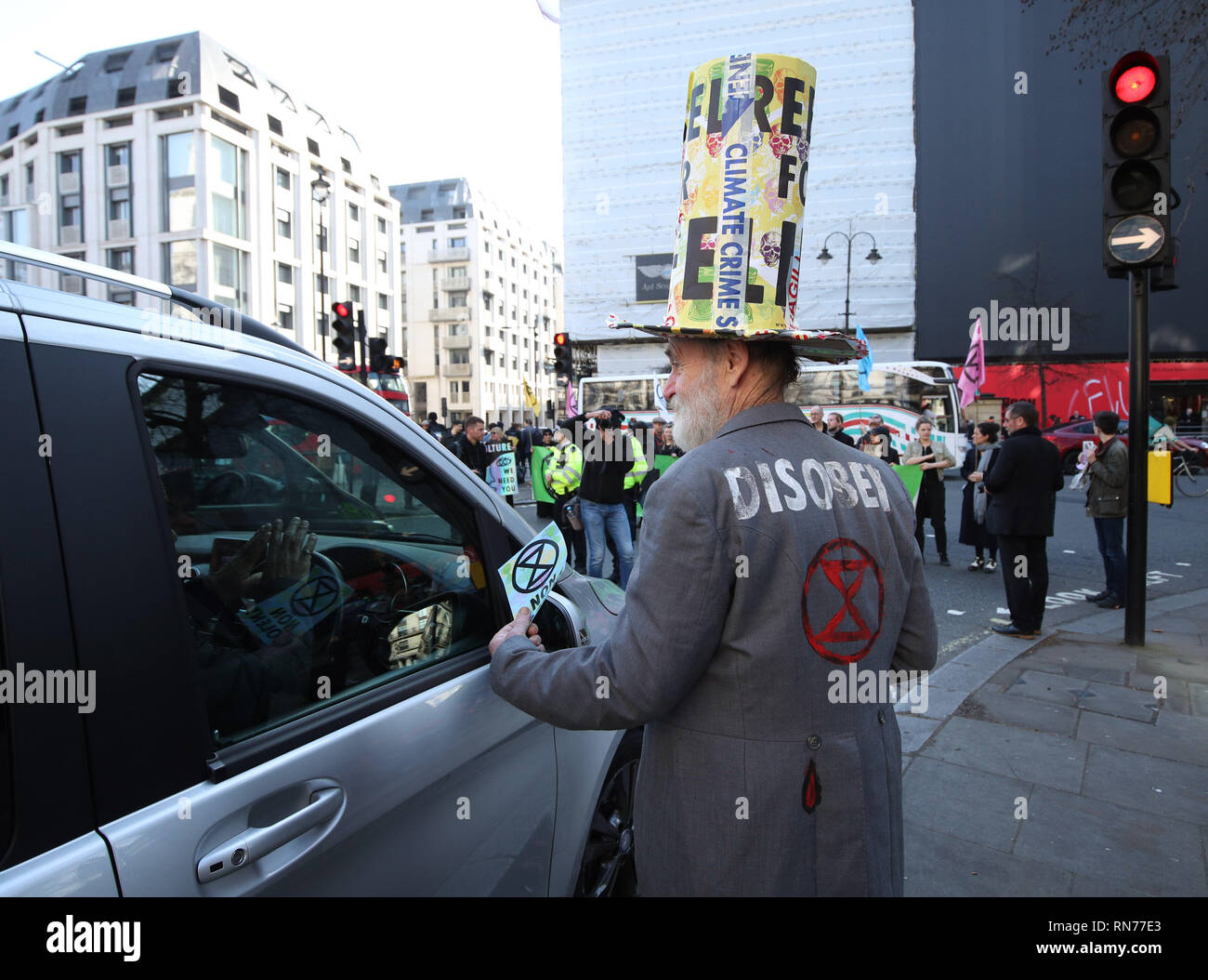 Climate change activists take part in an Extinction Rebellion protest ...