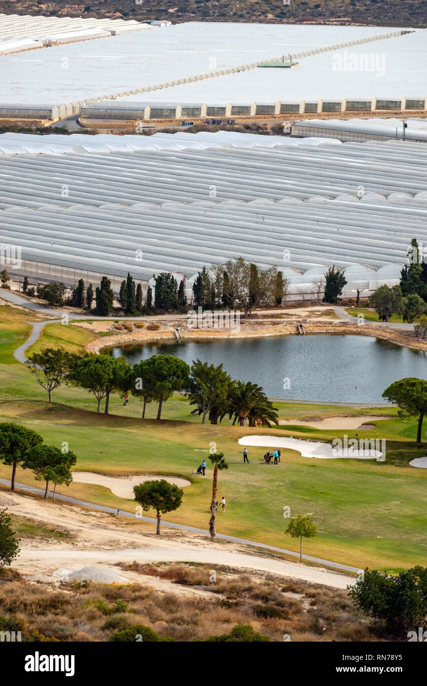 Bonalba golf resort and urbanisation with surrounding plastic covered ...