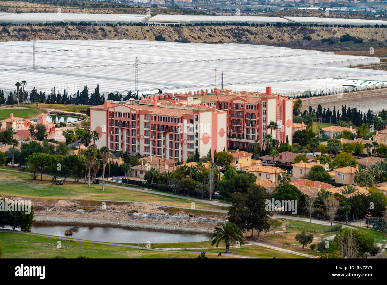 Bonalba golf resort and urbanisation with surrounding plastic covered ...