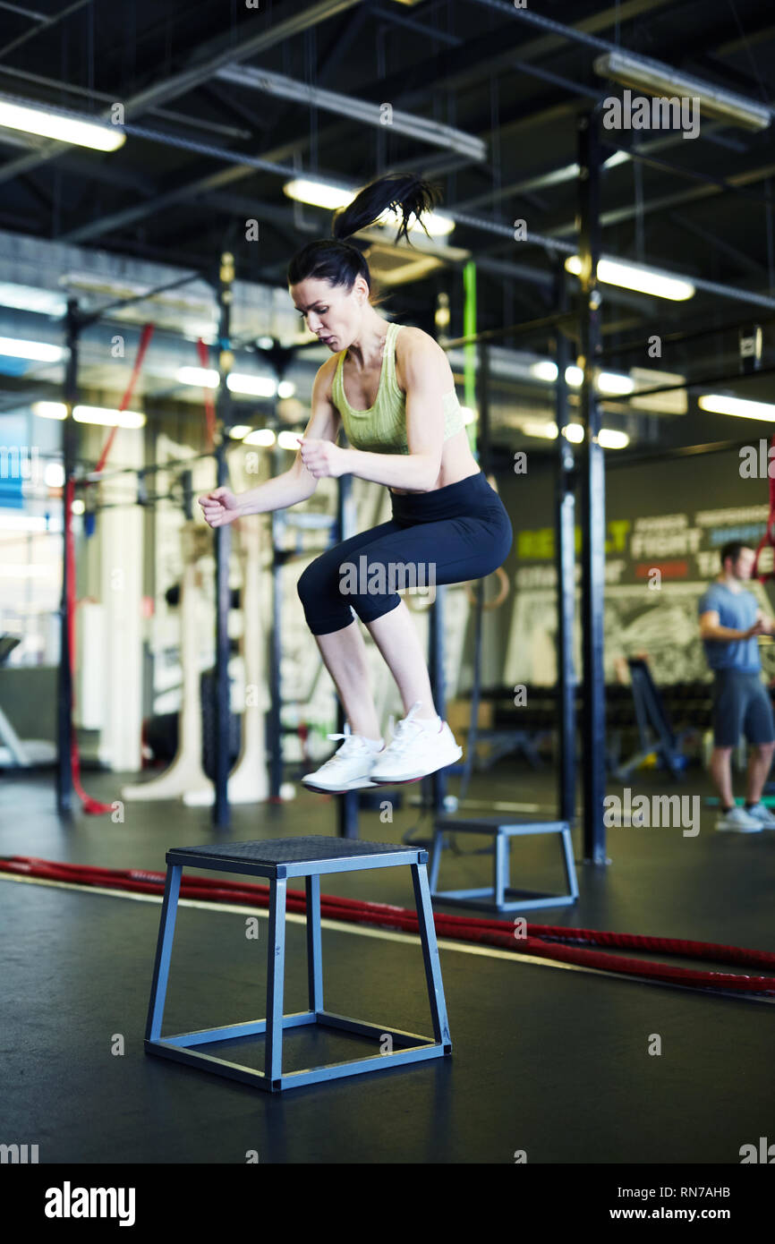 Jumping in gym Stock Photo - Alamy
