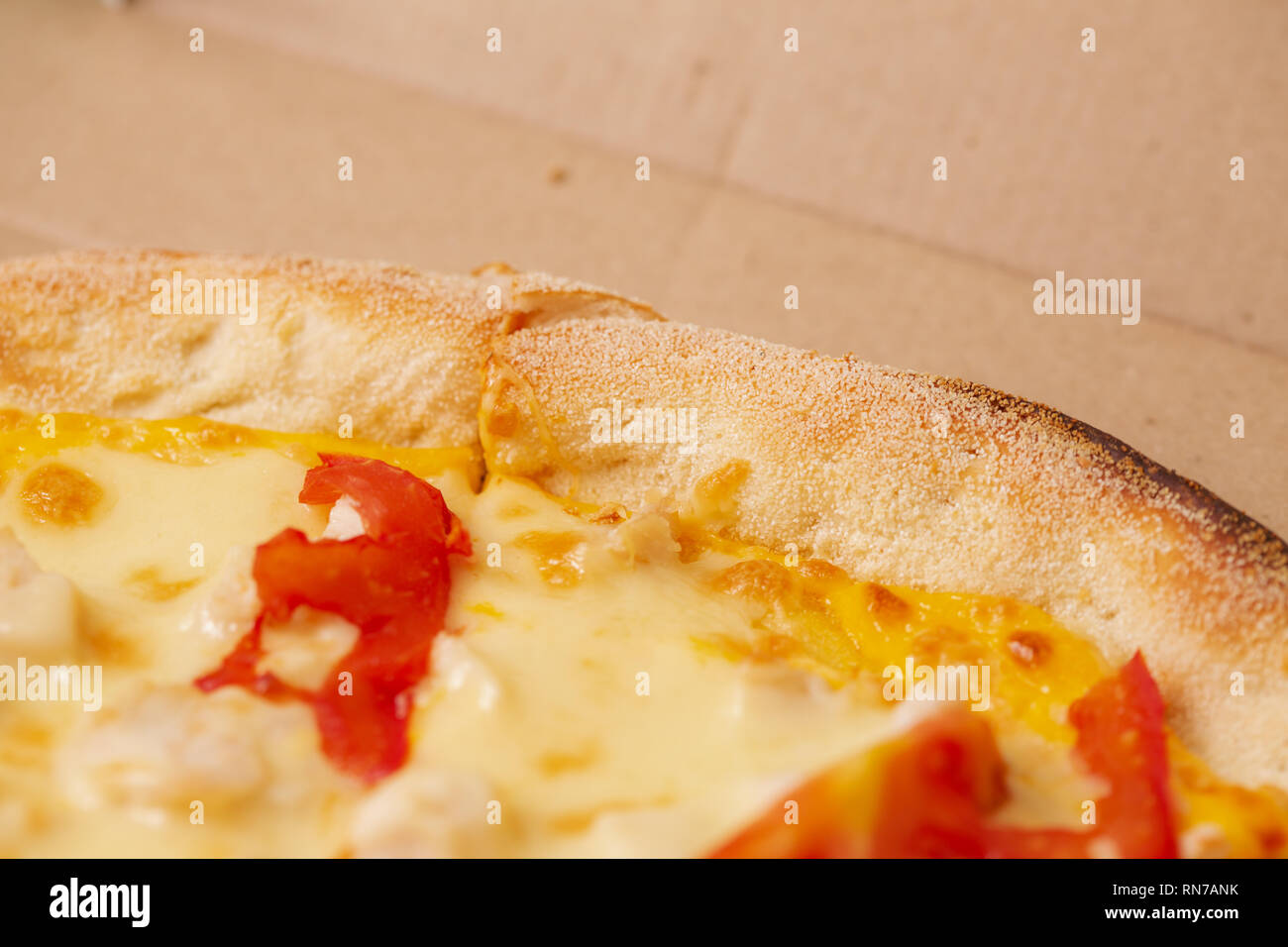 pizza with cheese in a cardboard box Stock Photo - Alamy