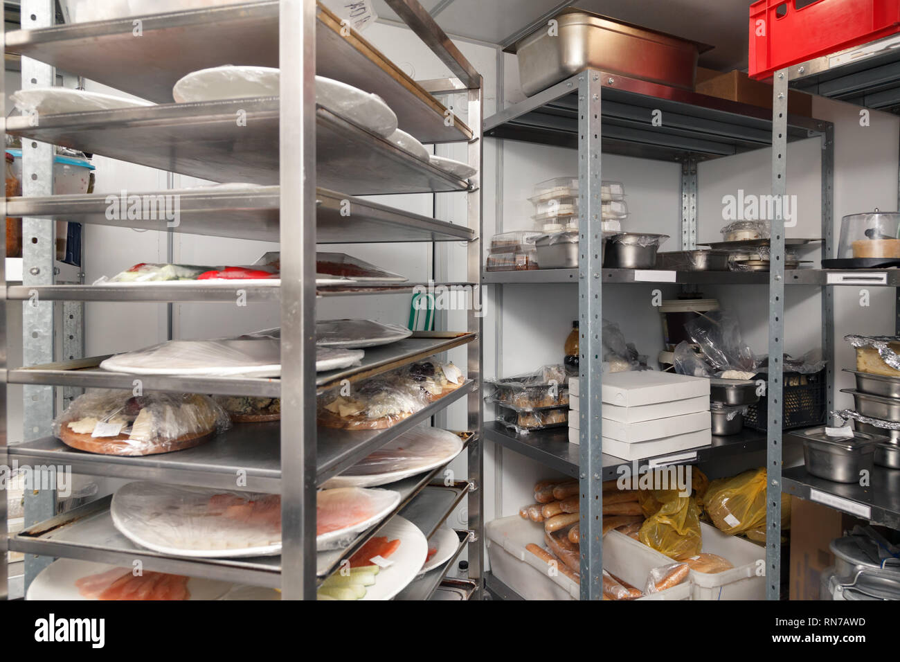 Different foods, fruits and vegetables, greens, pre-cooked dishes on ...