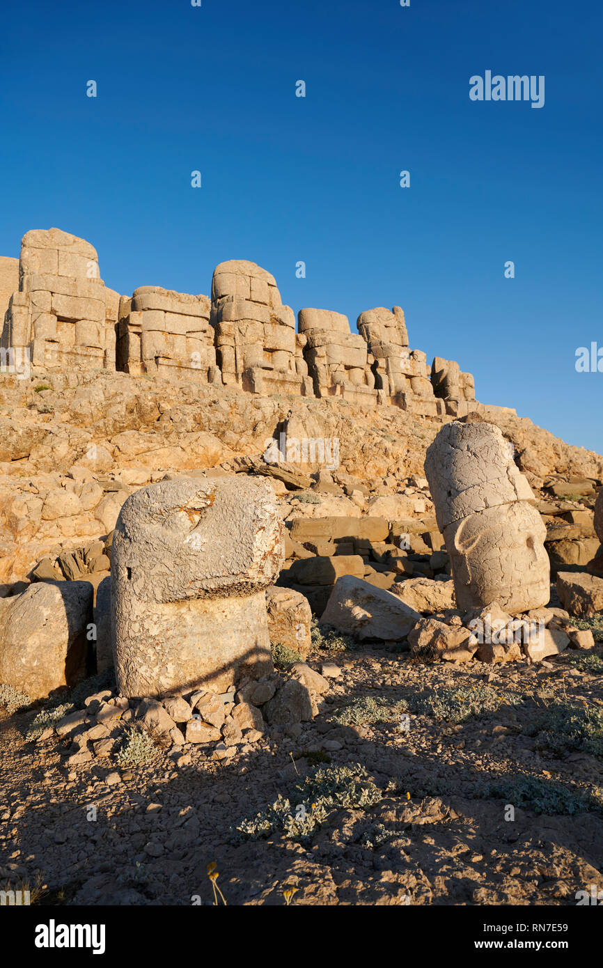 Statue heads, from left, Eagle & Antiochus with headless seated statues ...