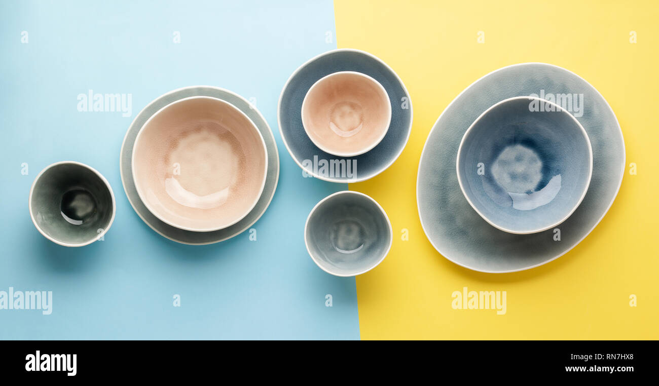 Beautiful blue, grey, beige dinnerware, plates bowls on blue yellow ...