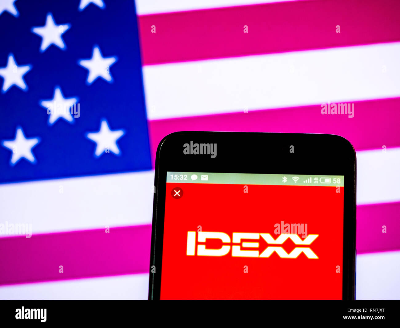 IDEXX Laboratories, Inc. logo seen displayed on smart phone Stock Photo ...