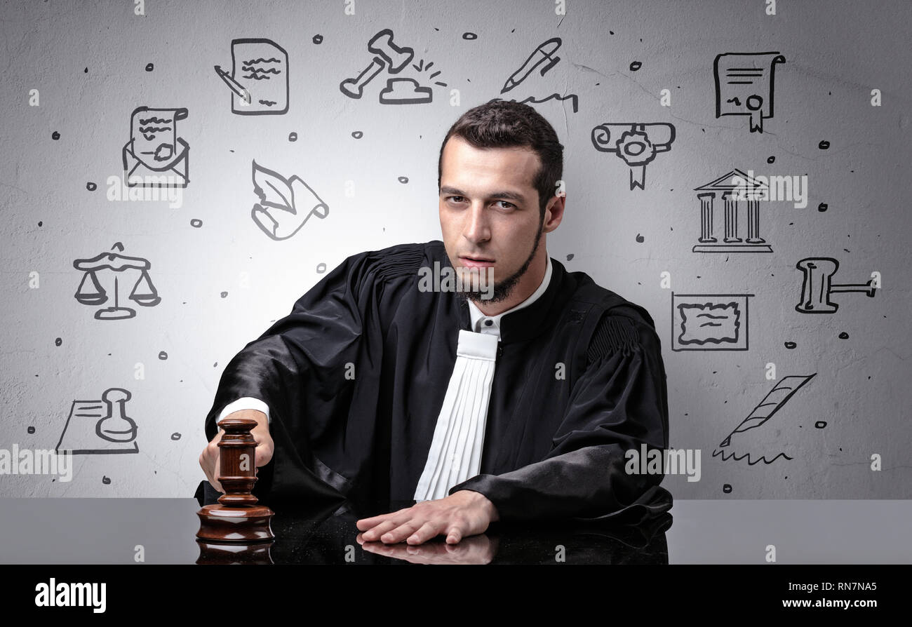 Handsome judge with court symbols around Stock Photo - Alamy