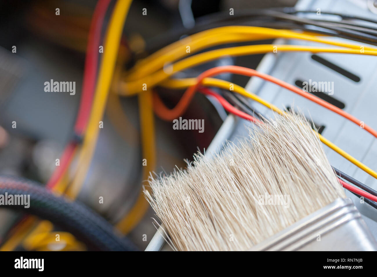 desktop computer dust cleaning with tassel. computer power wires Stock ...