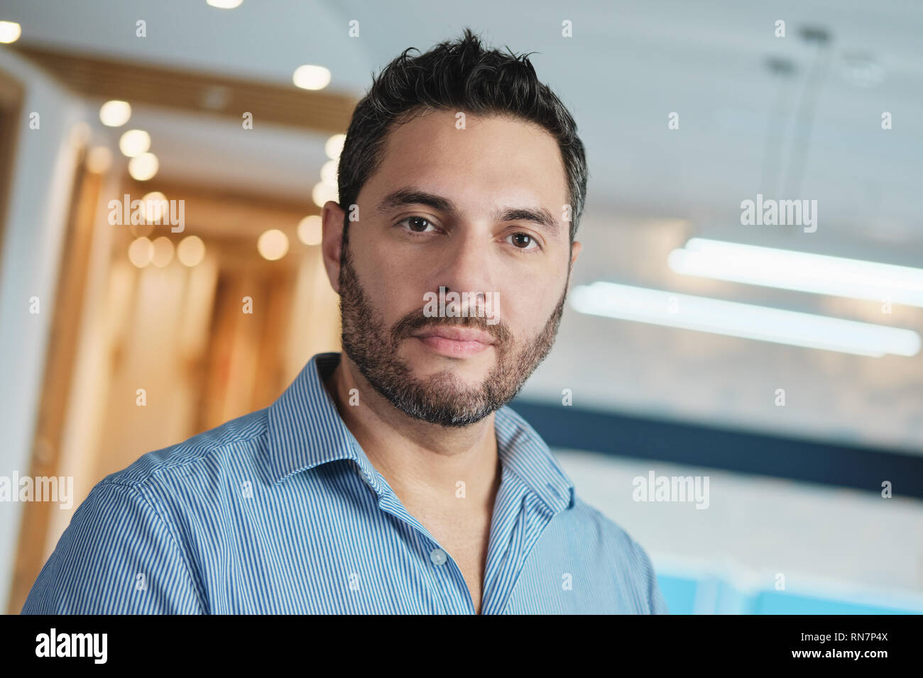 Portrait Of Happy Young Manager Business Man Smiling At Work Stock ...