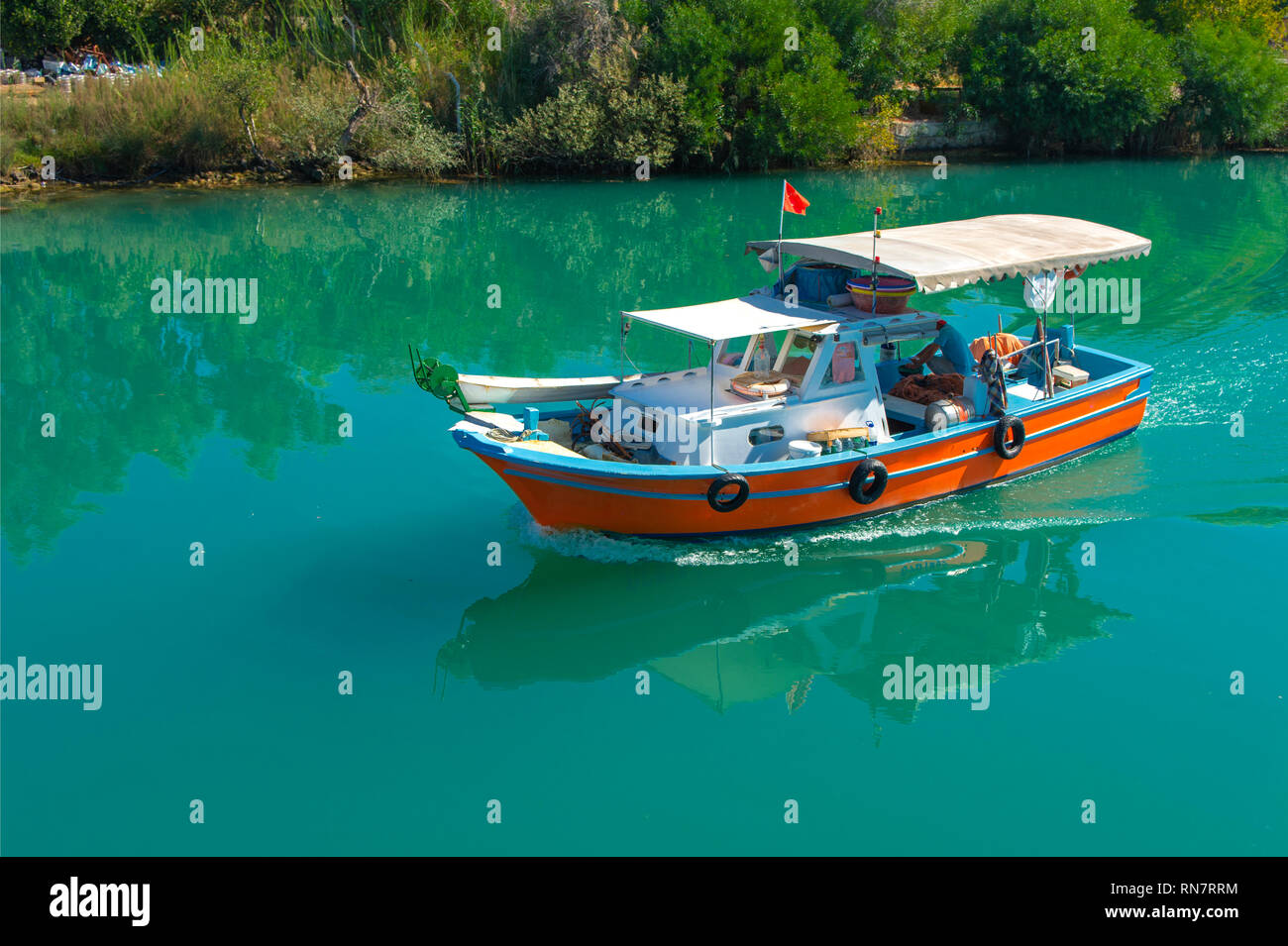 White speedboat on the background of the coast and blue sky. Photos of ...