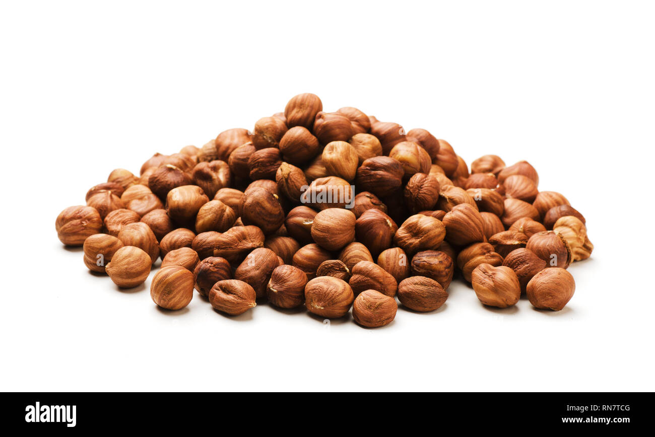 Handful of hazelnut nuts isolated on white background Stock Photo - Alamy