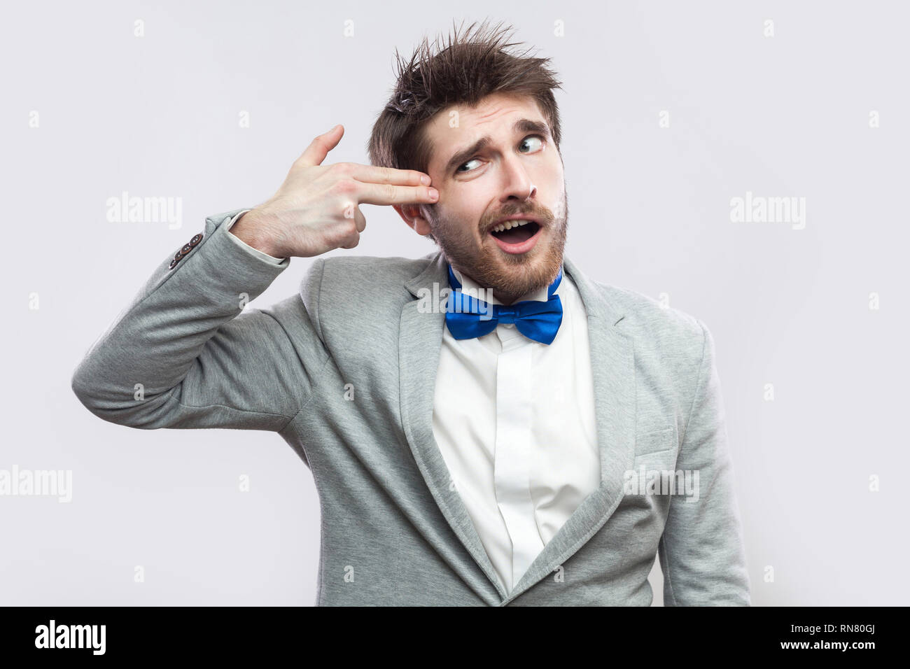 Funny businessman gun on white hi-res stock photography and images - Alamy