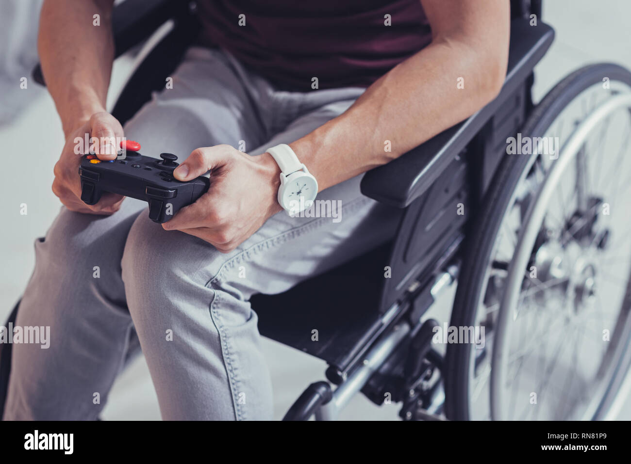 Disabled man playing video game hi-res stock photography and images - Alamy