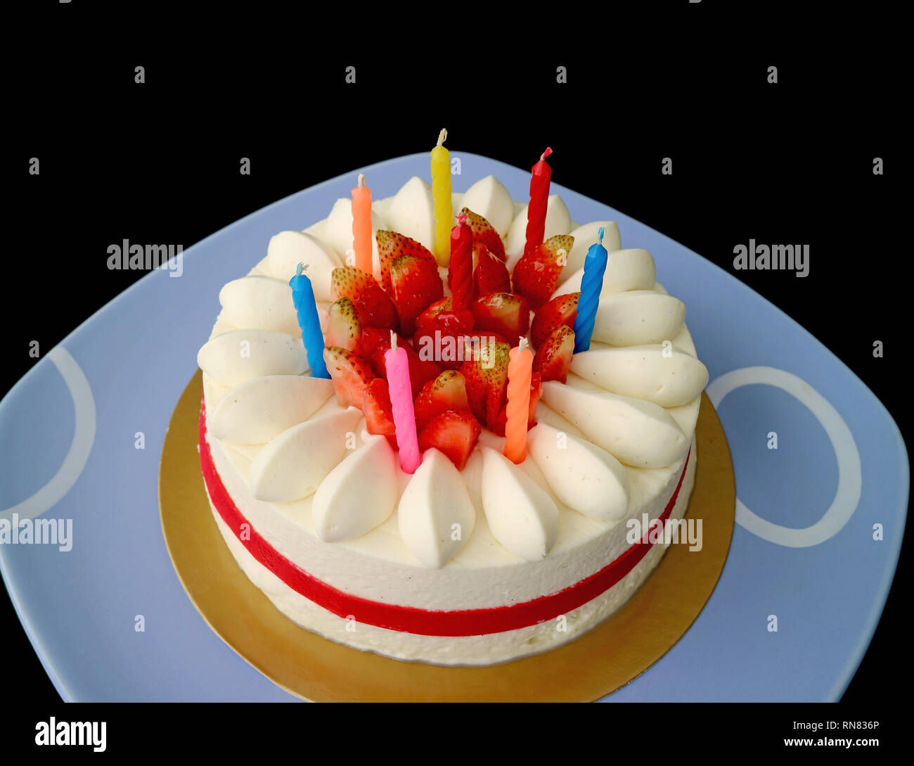 Strawberry Vanilla Short Cake with Multi-color Candles Preparing for ...