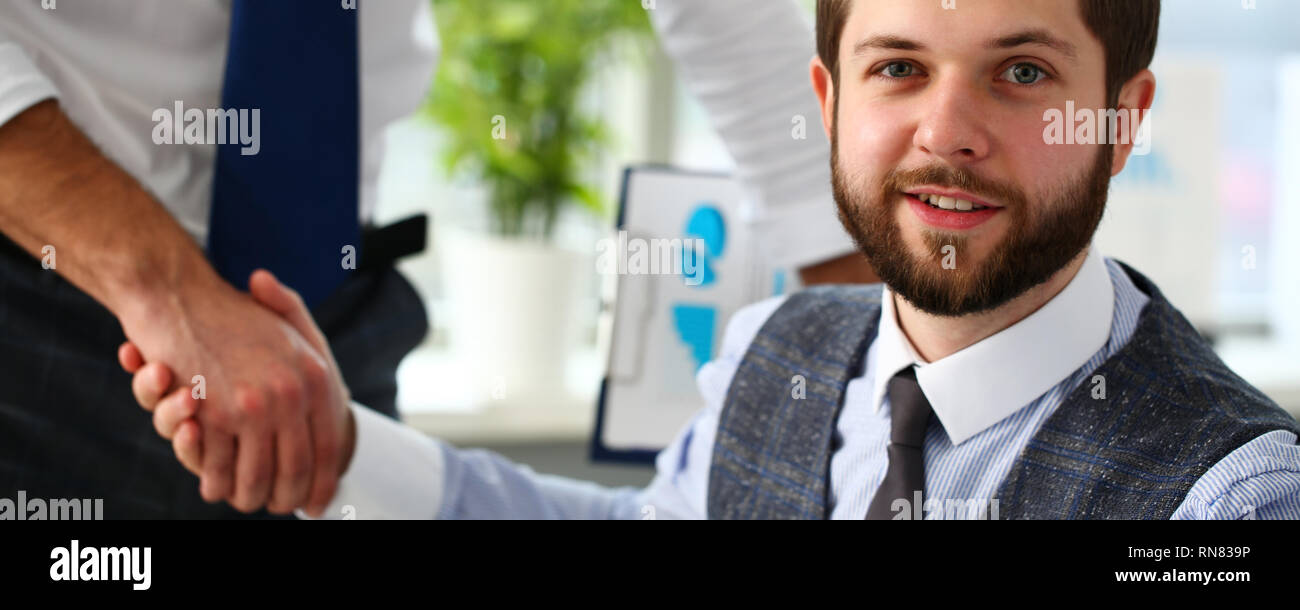 Man in suit and tie give hand as hello in office Stock Photo - Alamy