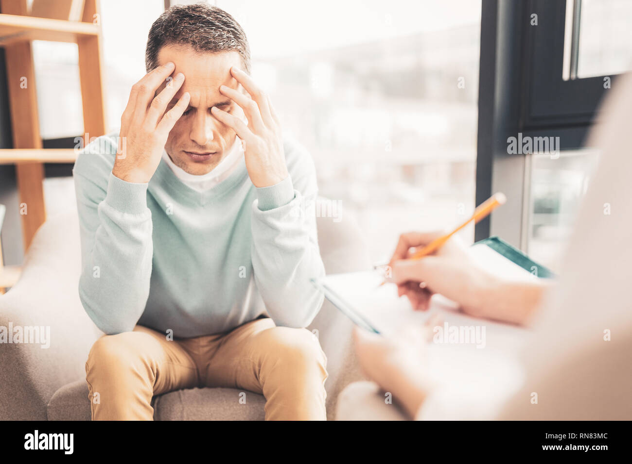 Troubled man hi-res stock photography and images - Alamy