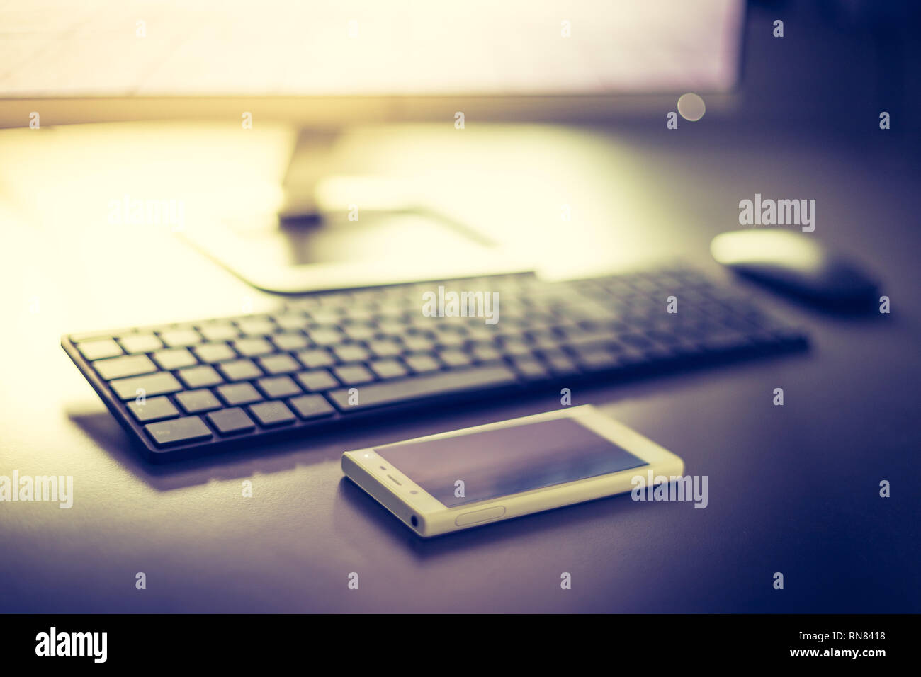 Workplace of a freelancer: Arrangement of computer, keyboard and ...