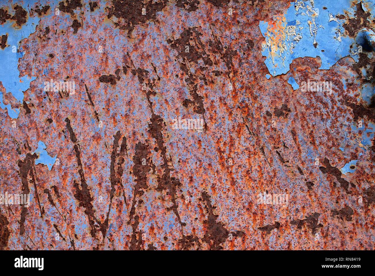 Close up surface of aged and weathered rusty metal surfaces in high ...