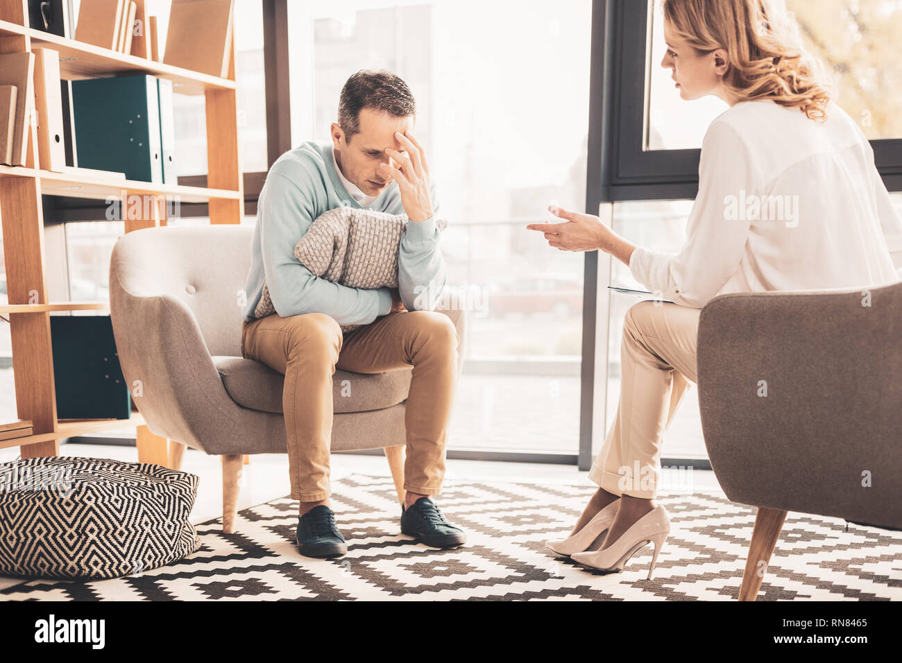 Speaking to client hi-res stock photography and images - Alamy