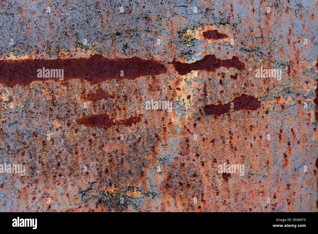 Close up surface of aged and weathered rusty metal surfaces in high ...