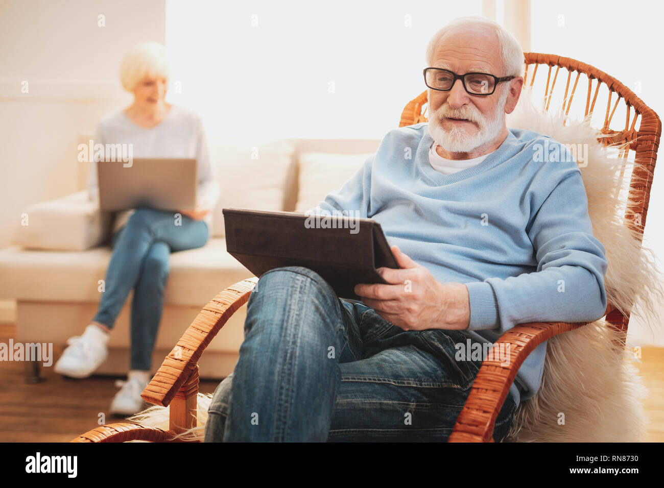 Political article. Smart aged man feeling involved while reading ...