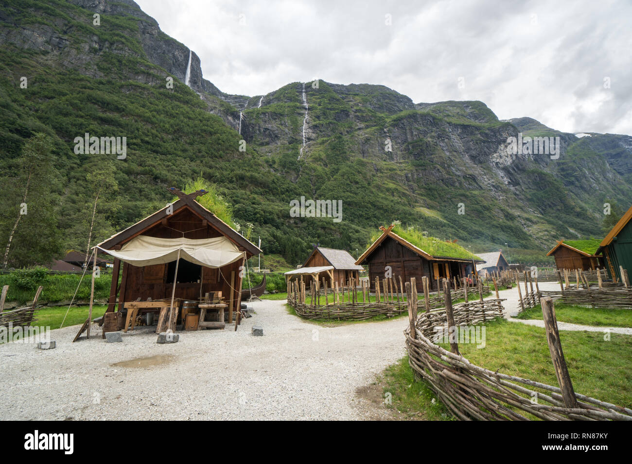 Dramatic outdoor view of reconstructed traditional viking village with ...