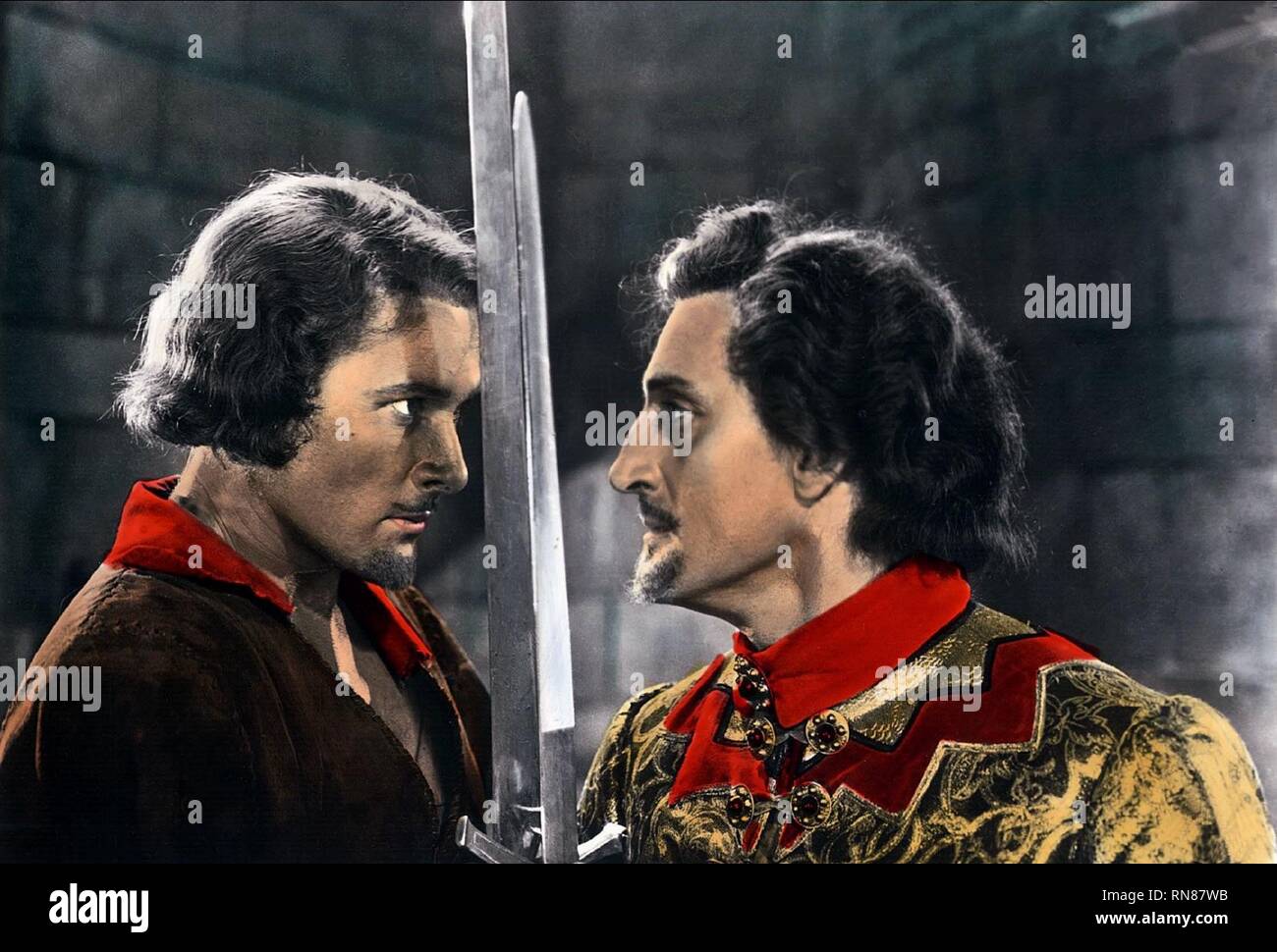 FLYNN,RATHBONE, THE ADVENTURES OF ROBIN HOOD, 1938 Stock Photo - Alamy