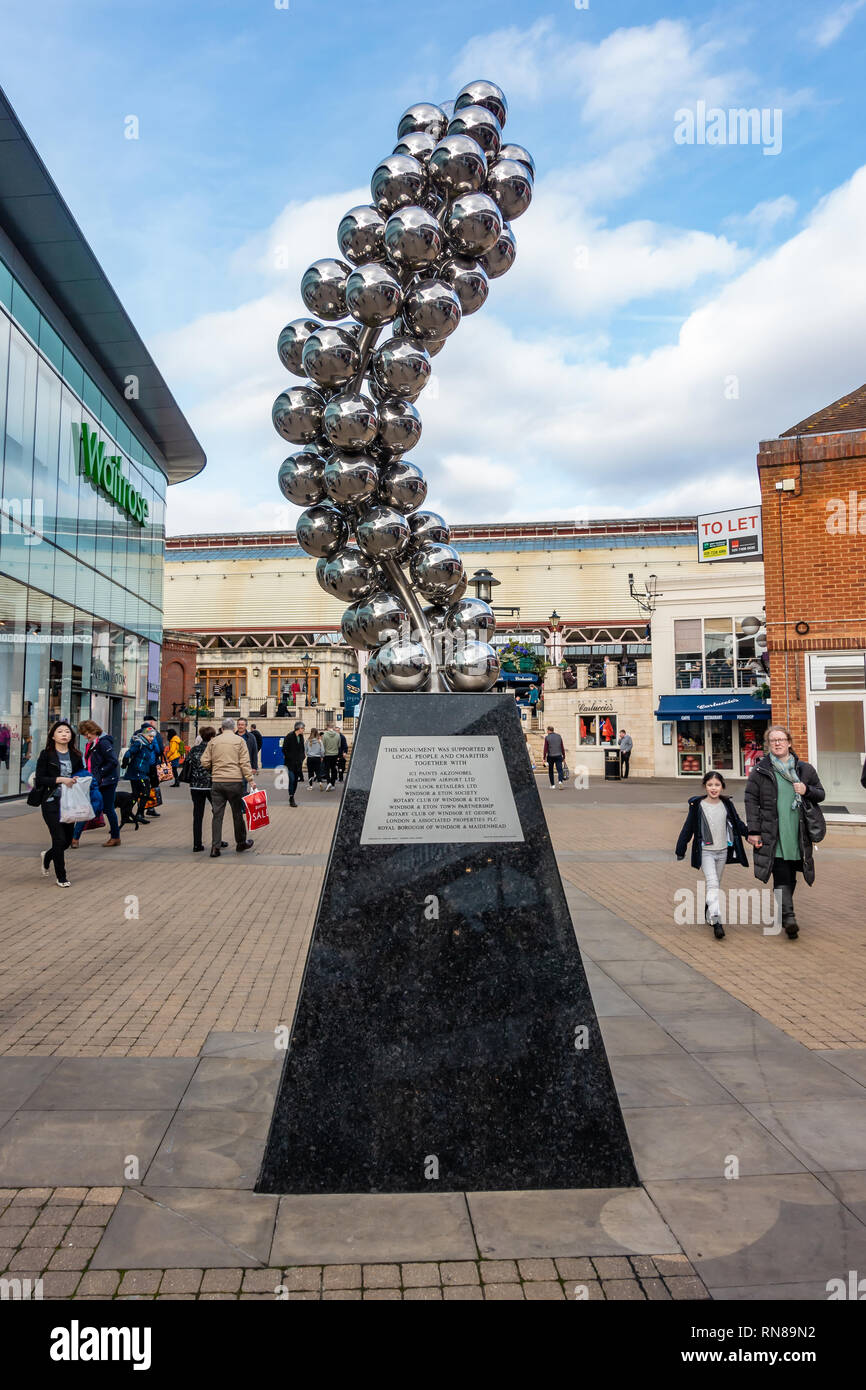 A modern, contemporary artwork monument consisting of shiny silver ...