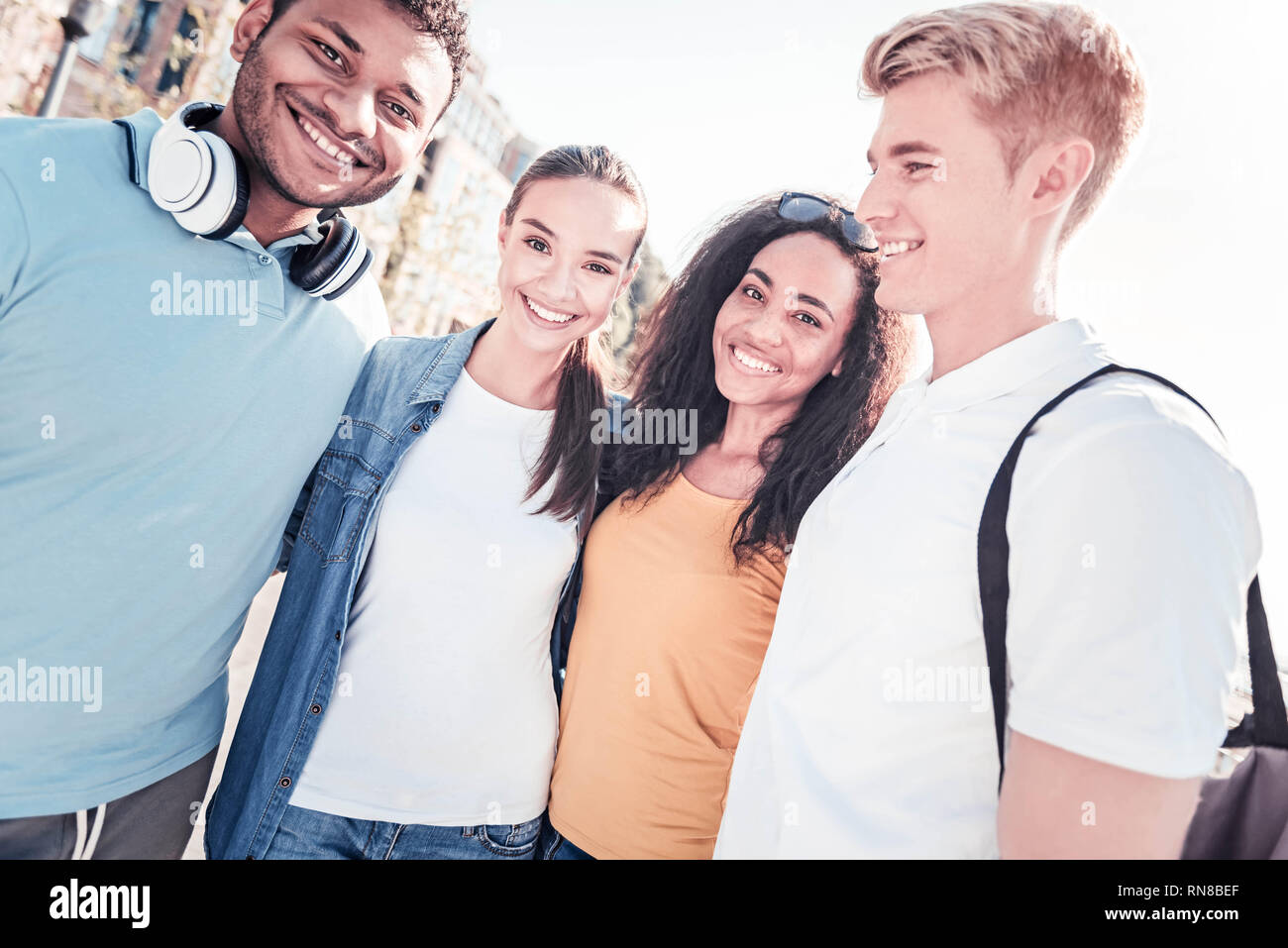 Delighted group mates looking hi-res stock photography and images - Alamy