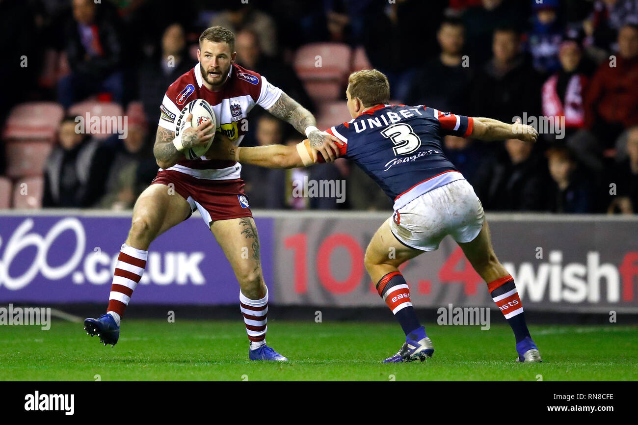 Wigan Warriors' Zak Hardaker (left) runs at Sydney Roosters' Mitchell ...