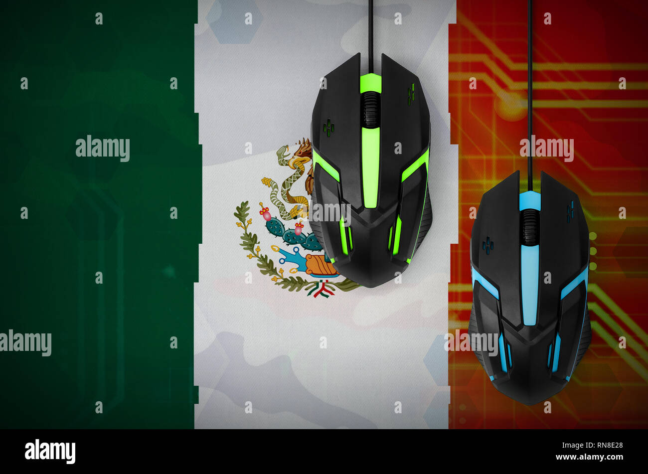 Mexico flag and two modern computer mice with backlight. The concept of ...