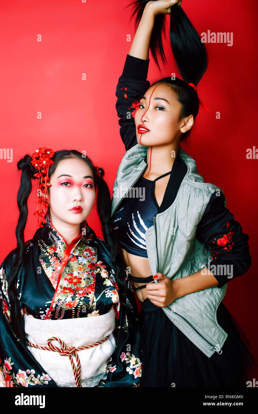 two pretty geisha girls friends: modern asian woman and traditional ...