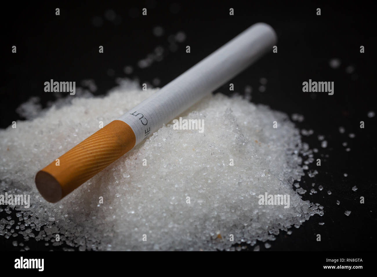 cigarette and sugar Stock Photo - Alamy