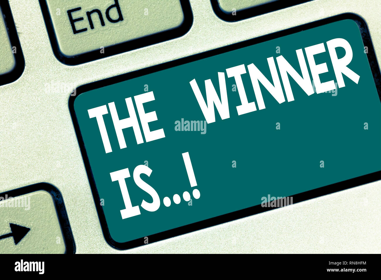 Handwriting text writing The Winner Is . Concept meaning Announcing who ...