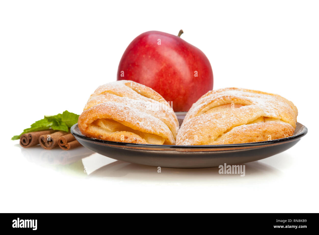 Apple and Cinnamon and mint buns on dish Stock Photo - Alamy
