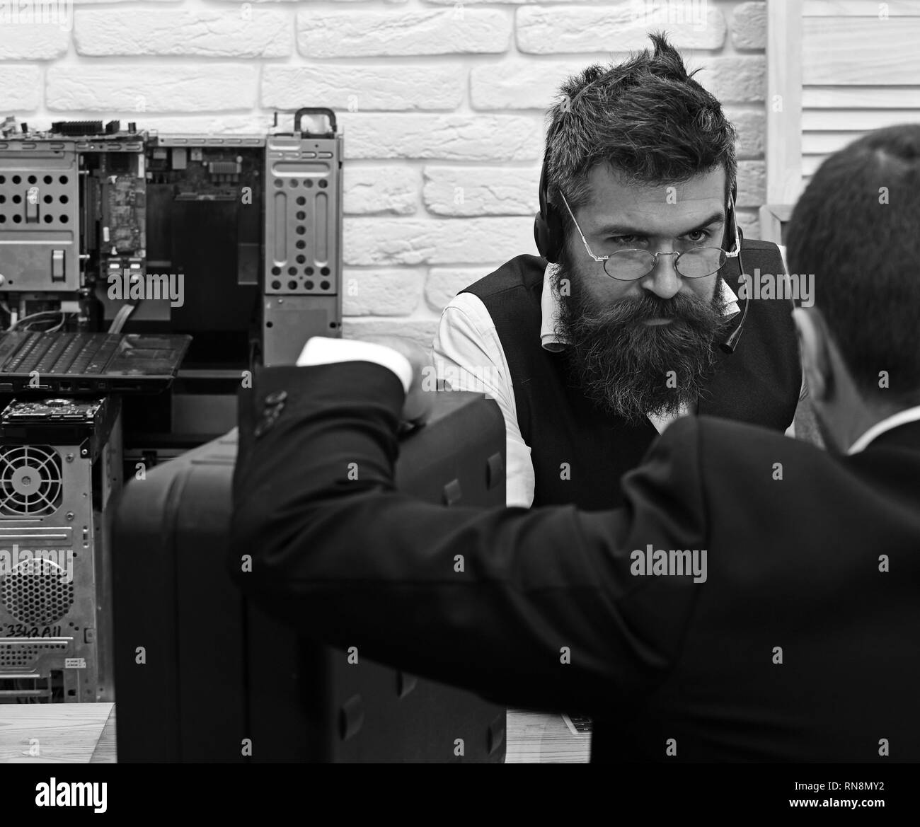 Meeting listen Black and White Stock Photos & Images - Alamy