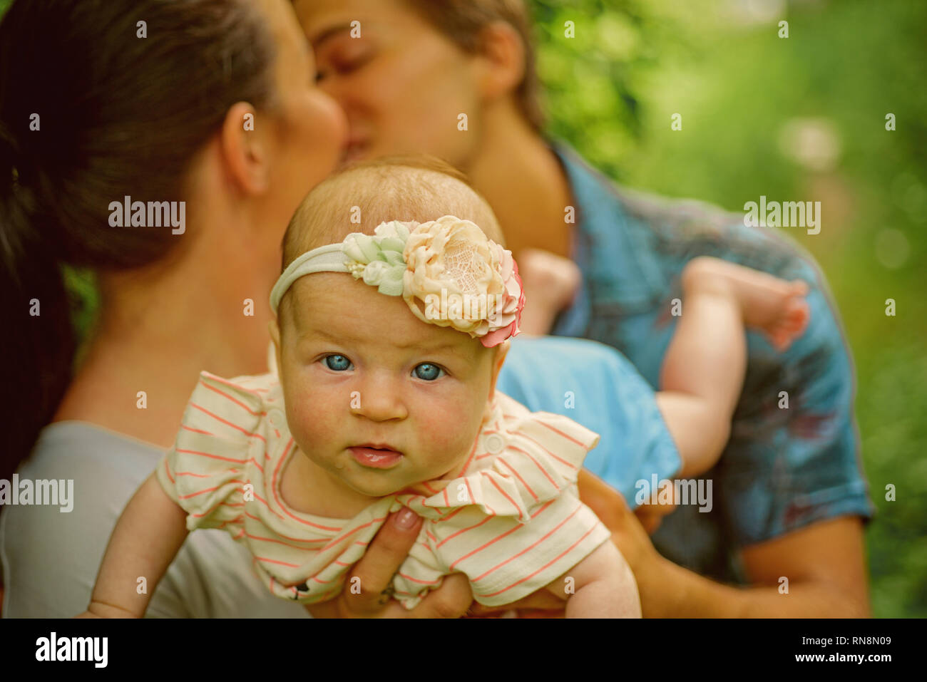 Mutual understanding between parents in family. Family love of newborn ...