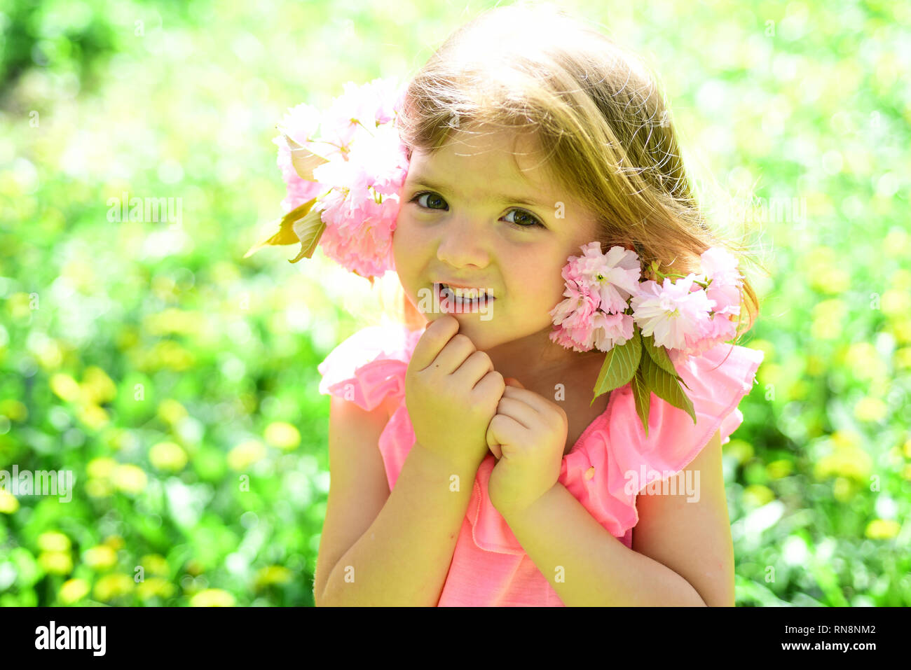 Wonderful smell. Small child. Natural beauty. Childrens day. Springtime ...