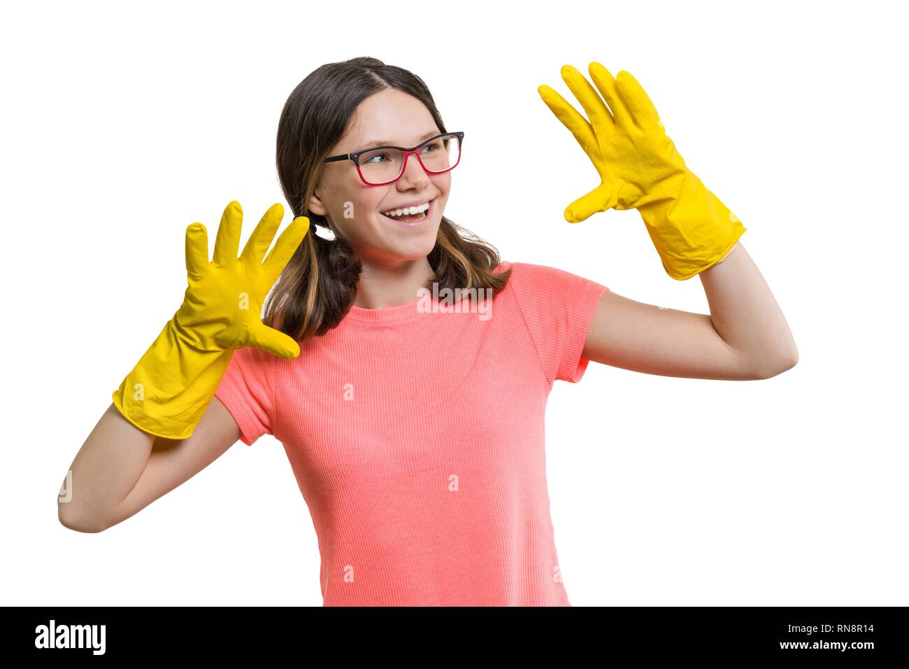 Young smiling cheerful girl in yellow rubber protective gloves, white ...