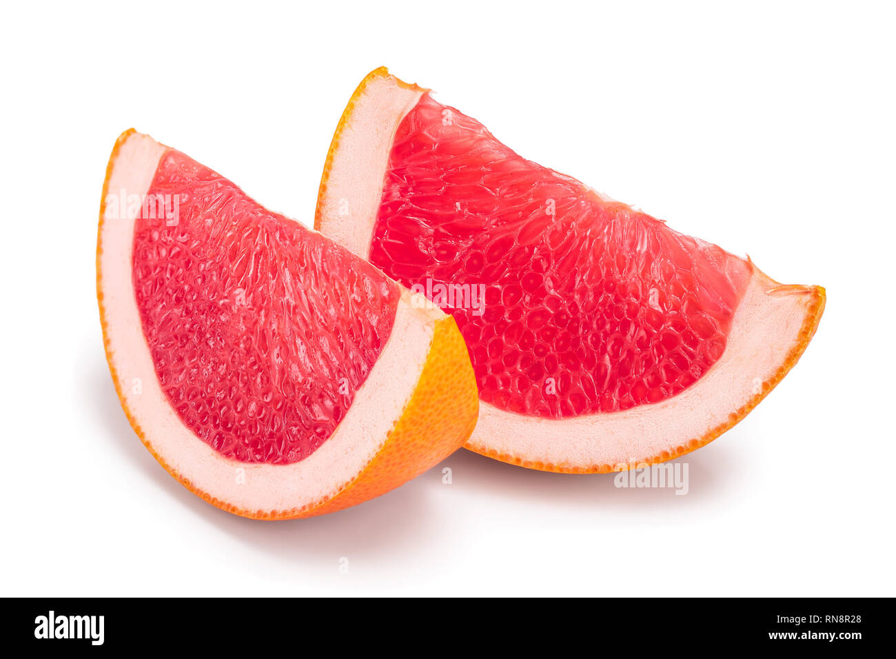 Grapefruit slice isolated on white background closeup Stock Photo - Alamy