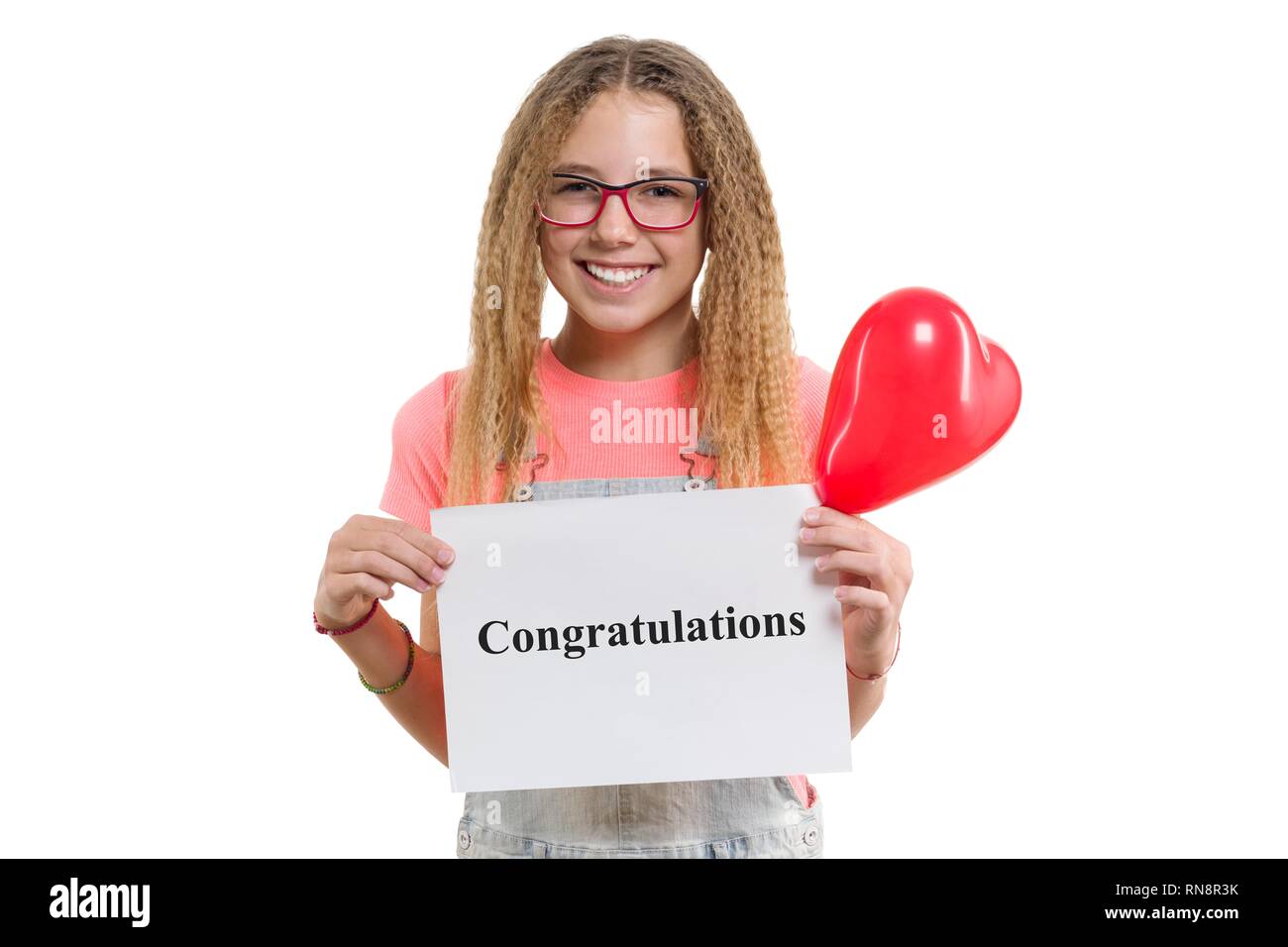 Congratulations text message written on white paper in hands pretty ...