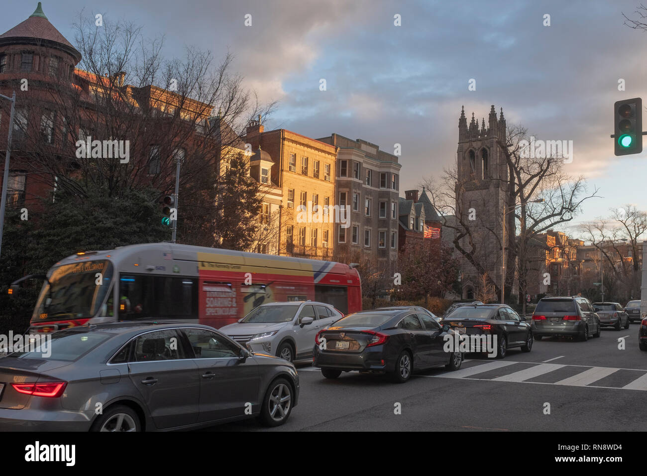 Rush hour traffic in the early evening light on 16th Street NW, in ...