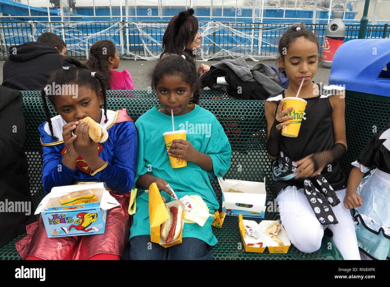 Children eating hot dogs after the Coney Island Halloween Children's ...