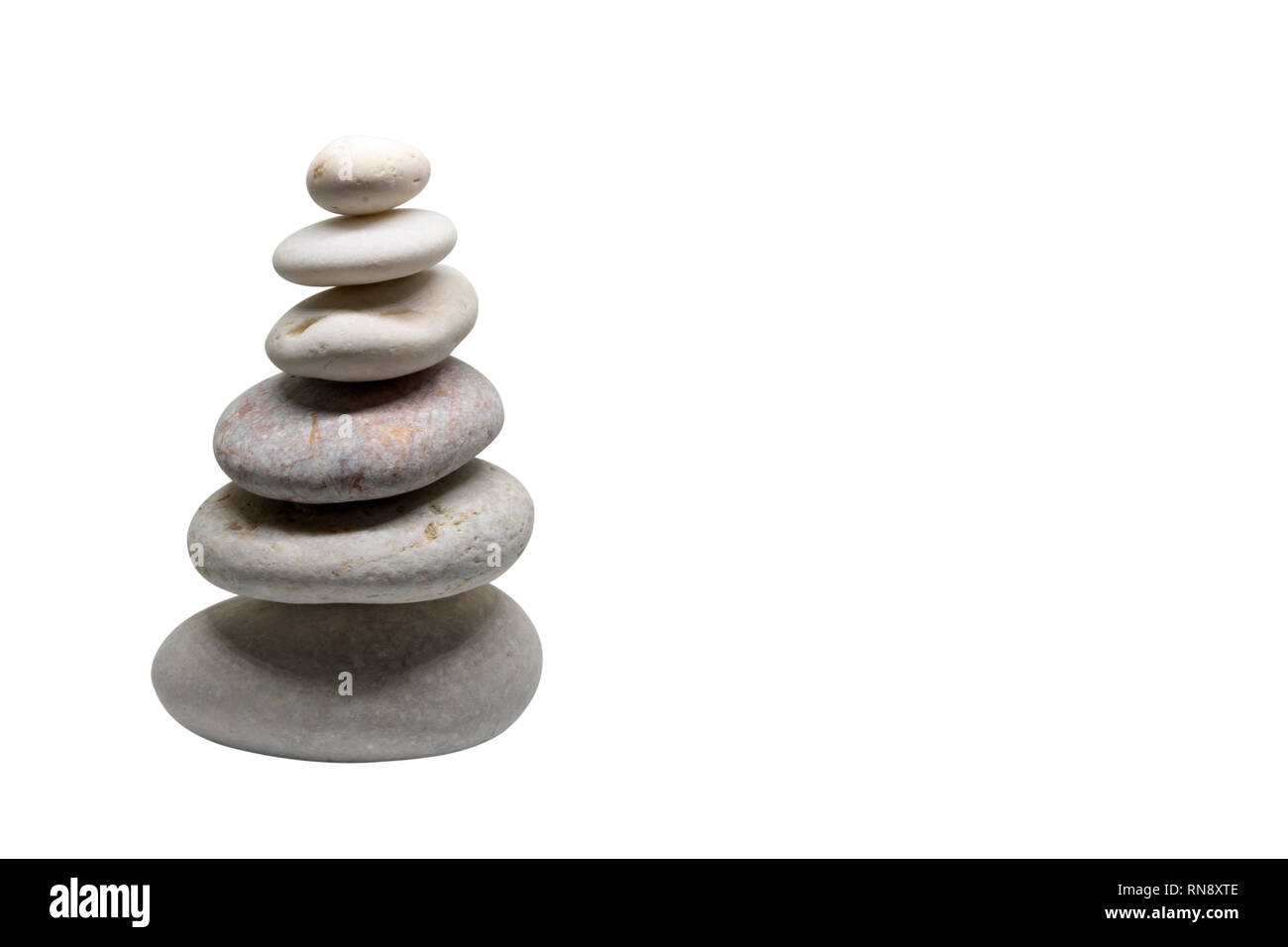 stacked pebbles isolated with white background Stock Photo - Alamy