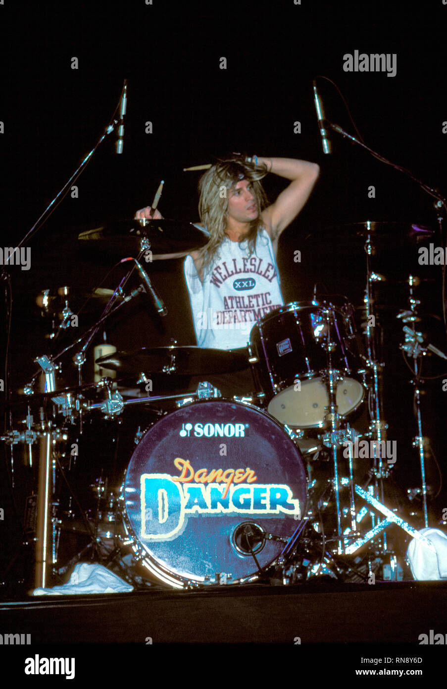 Danger Danger drummer is shown performing on stage during a "live ...